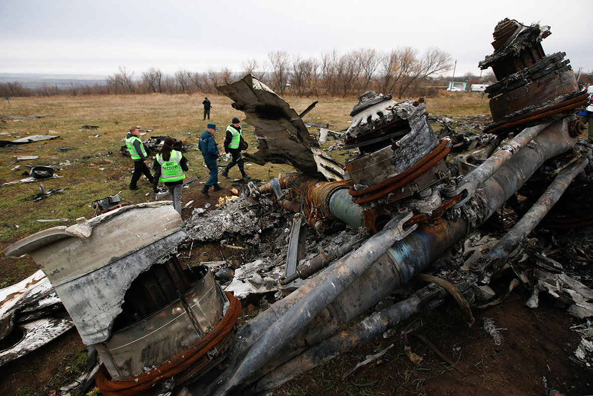 Malaysia Airlines MH17: Pathologist sacked after showing images of ...
