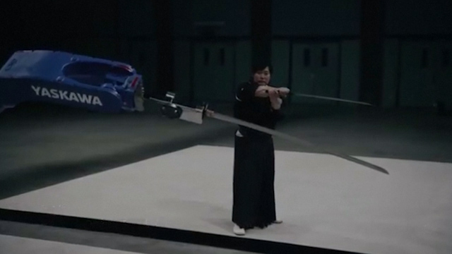 Robot and Japanese master swordsman compete in armed combat | IBTimes UK
