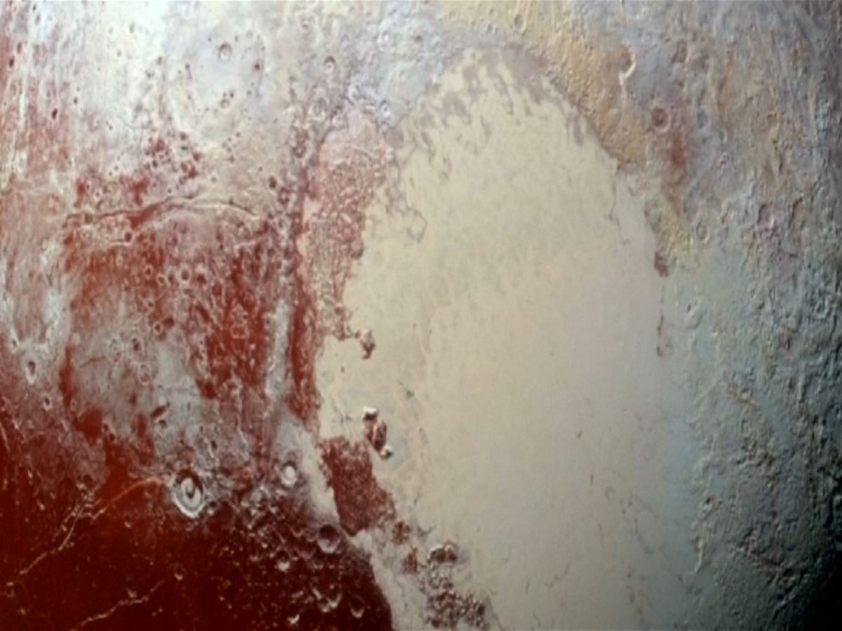 New Pluto images reveal snakeskin like texture