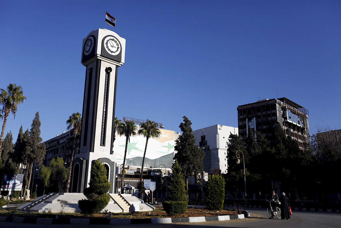 Syria: Shattered city of Homs returns to Assad control as fighters ...