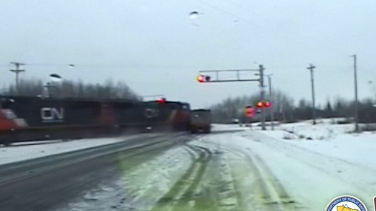 Dashcam captures moment train hits truck on crossing in dramatic ...