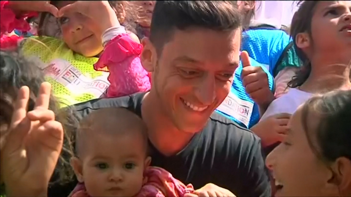 Germany and Arsenal star Mesut Ozil plays football with child refugees ... Germany and Arsenal star Mesut Ozil plays football with child refugees ...