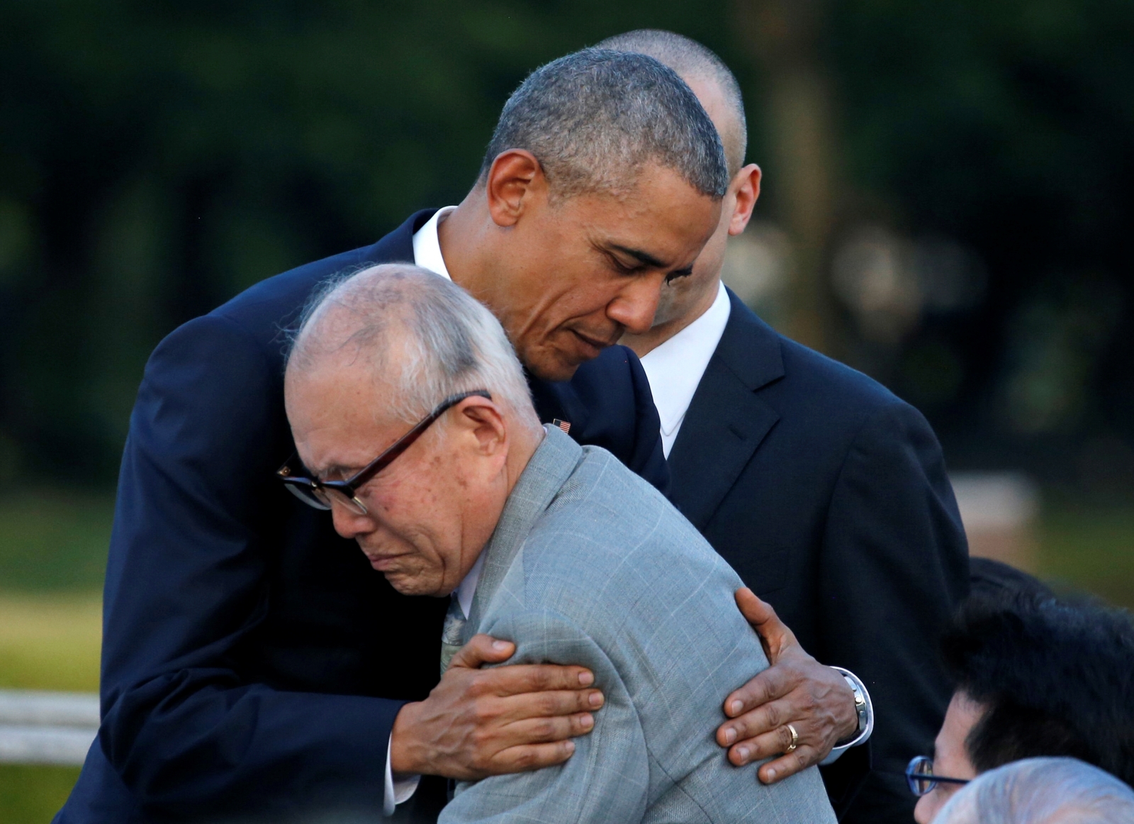 Barack Obama hugs Hiroshima survivor during historic visit to memorial site