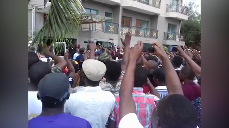 Protestors set fire to Gabon parliament building in fury at Ali Bongo's ...