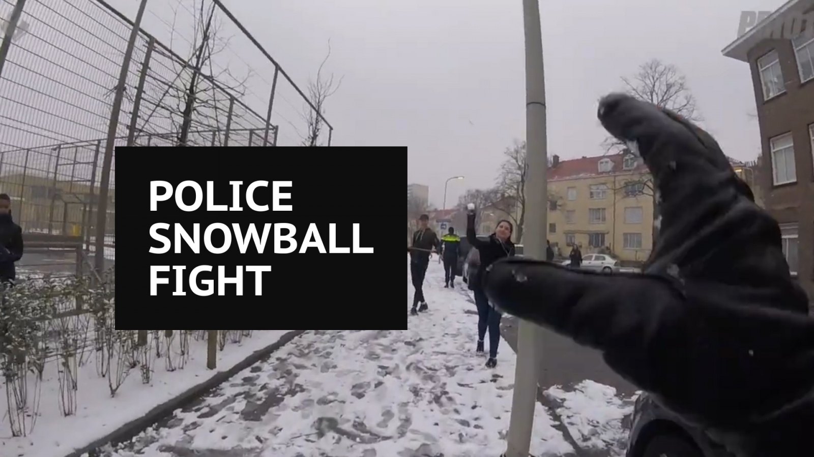 Gotcha!: Police snowball fight with children in Holland filmed on ...