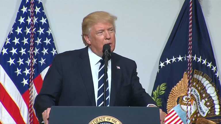 Donald Trump signs executive orders on trade to 'defend US industry ...