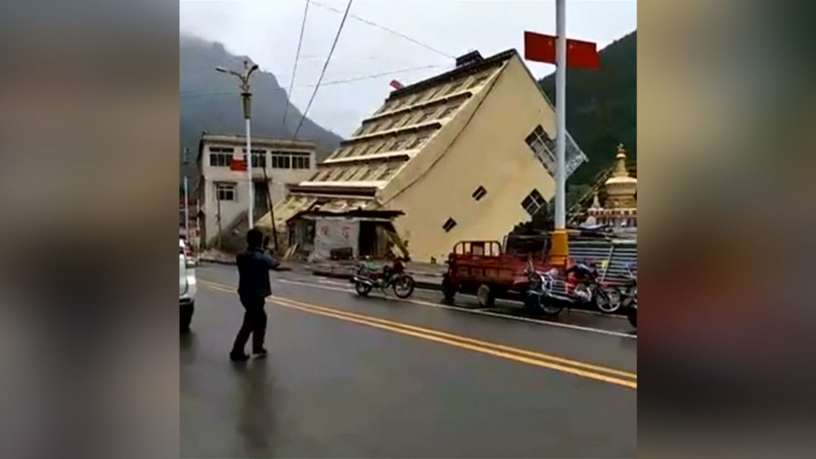 Shocking footage shows torrential rain bring a building crashing to the ...