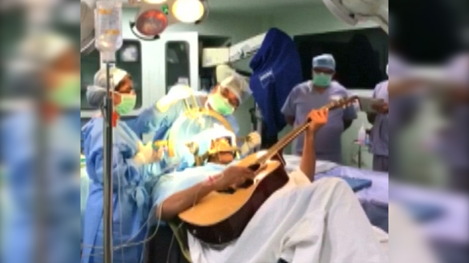 Indian techie-turned-musician plays guitar during his brain operation ...