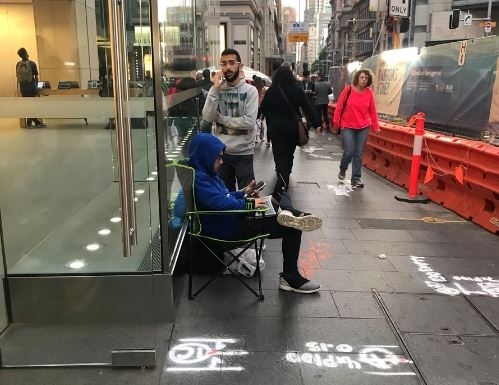 Apple fan starts queueing weeks before the new iPhone even goes on sale ...