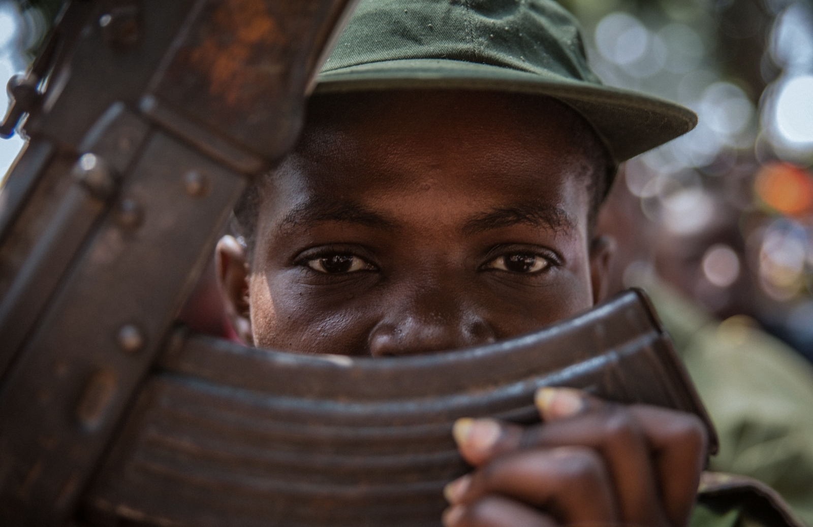 Over 300 child soldiers lay down their weapons after being released by ...